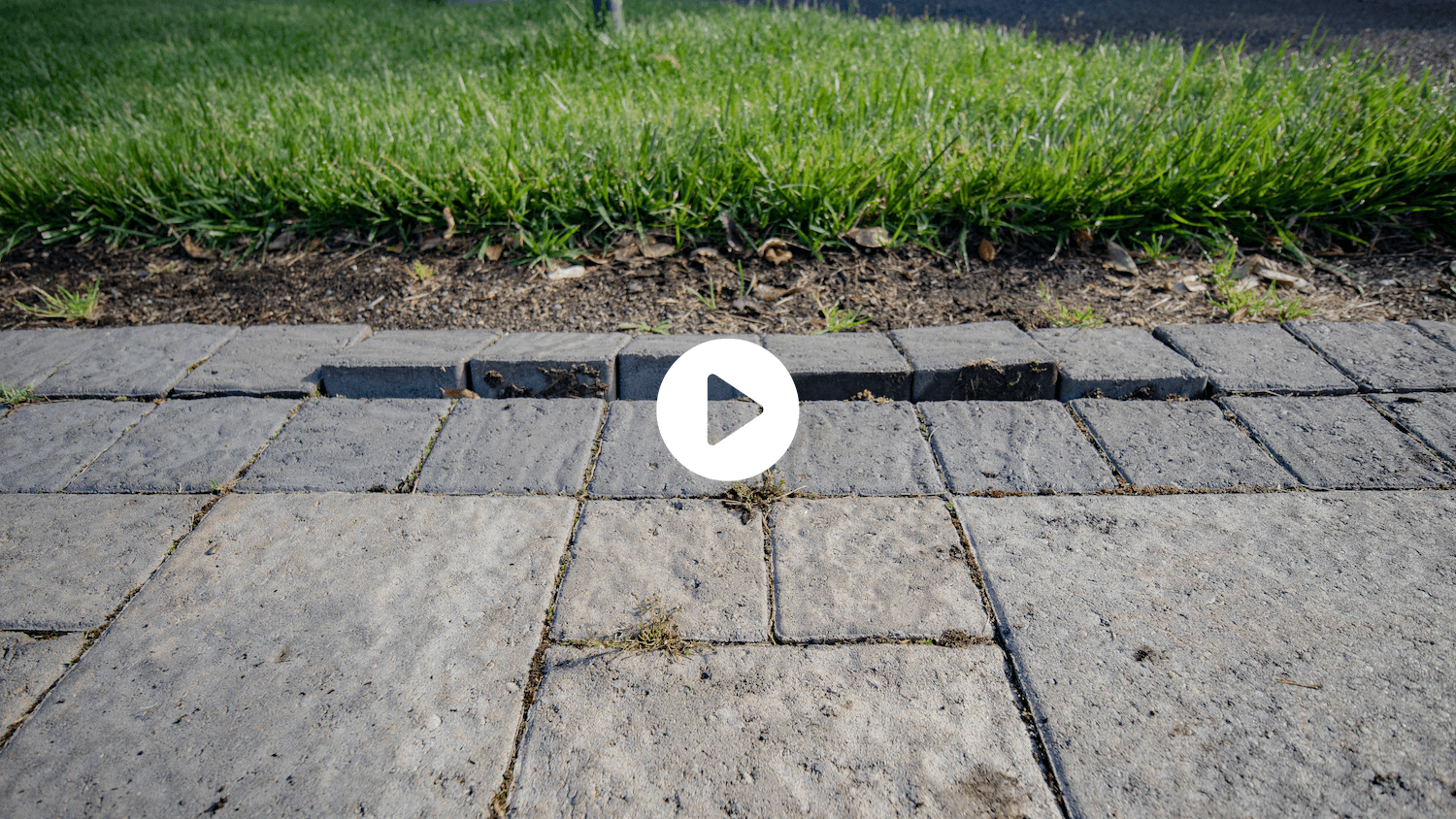 In this example, our walkway edge failed because landscapers drove over ...