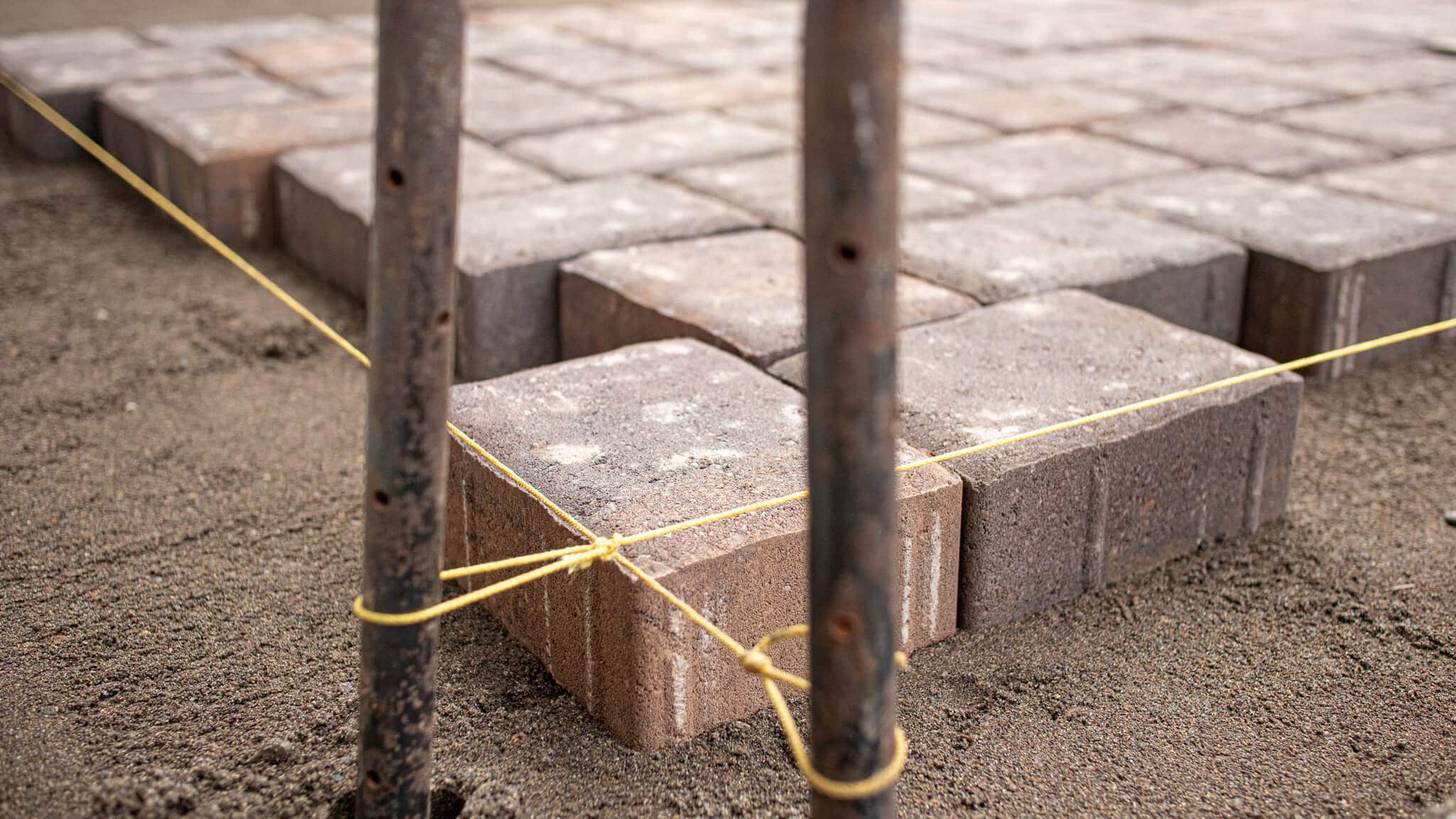 How to Lay a Curved Paver Walkway at Home | DIY