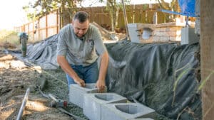 How to Install a Wall Drain for Your Retaining Wall | DIY