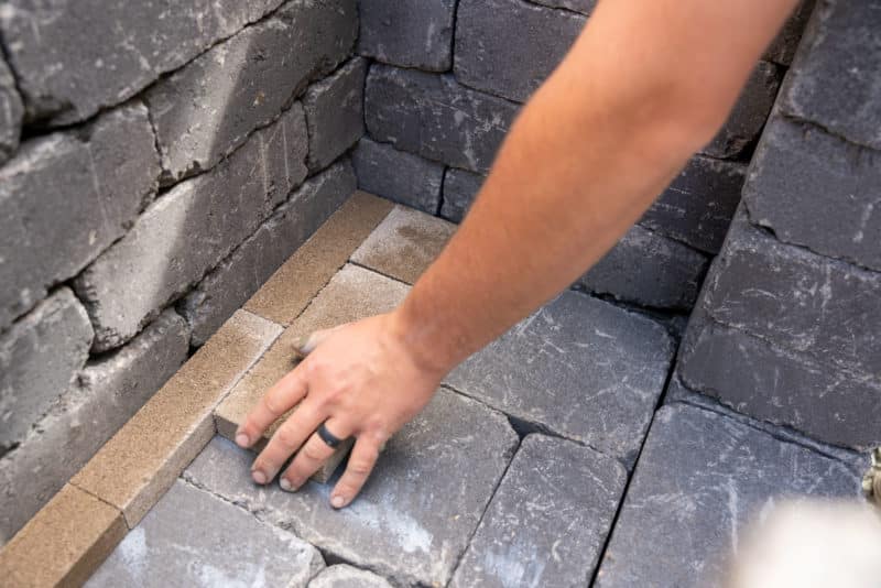 How to Install Firebrick in Your Outdoor Stone Fireplace | DIY