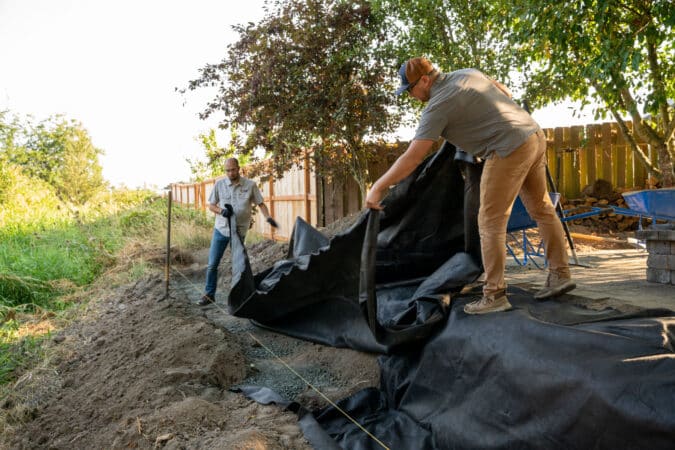 How to Retain a Steep Slope with Retaining Wall Blocks | DIY