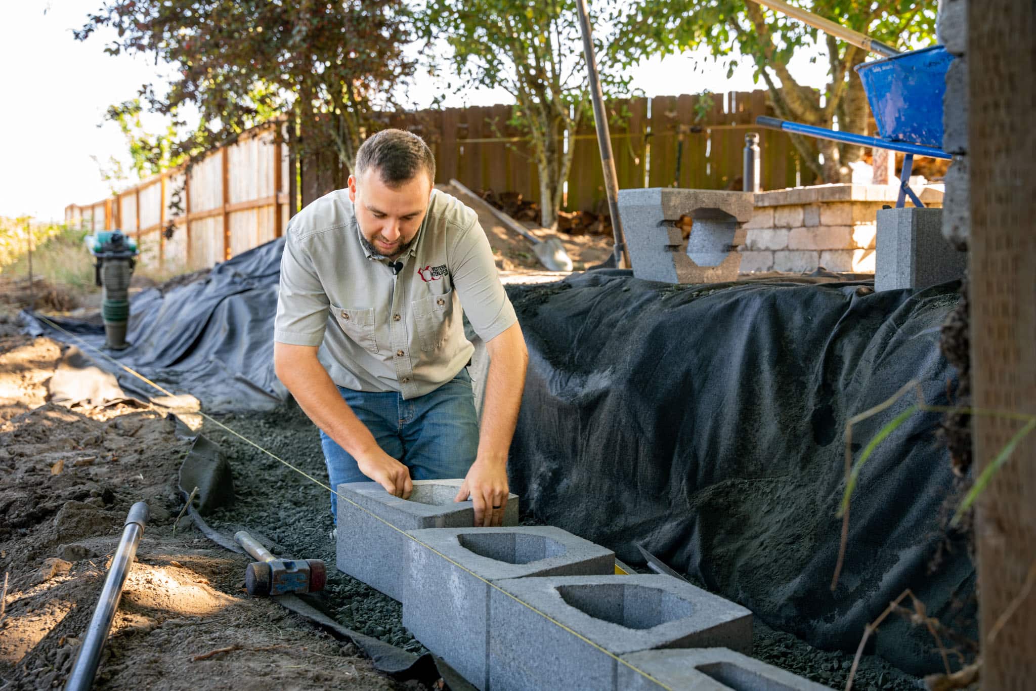 How to Retain a Steep Slope with Retaining Wall Blocks | DIY