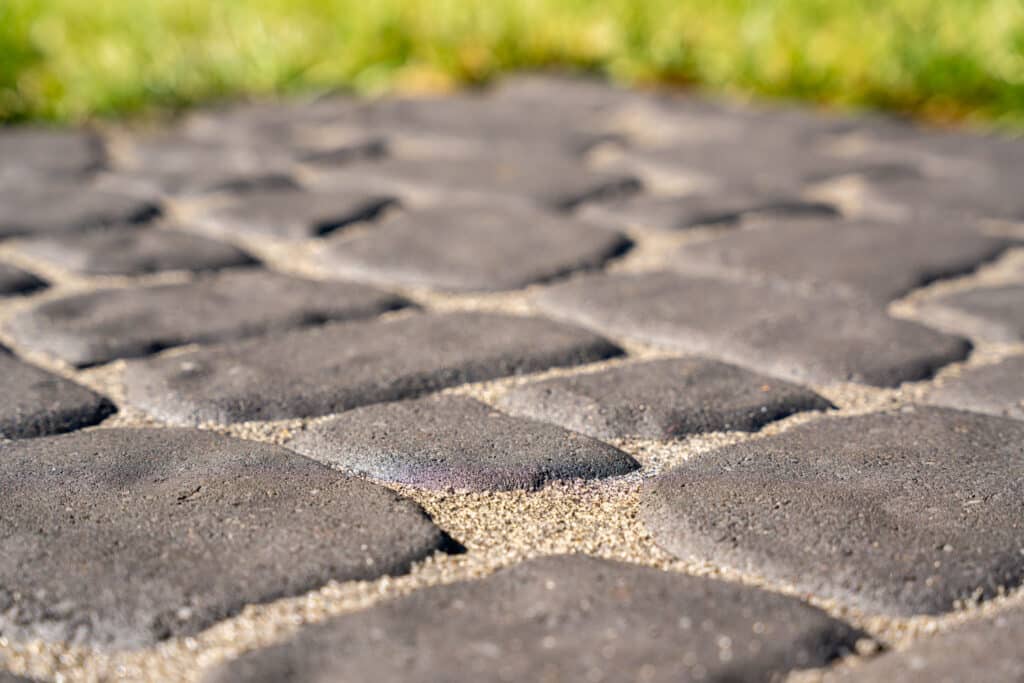 Joint Compound vs. Polymeric Sand: Which Is Better? | DIY